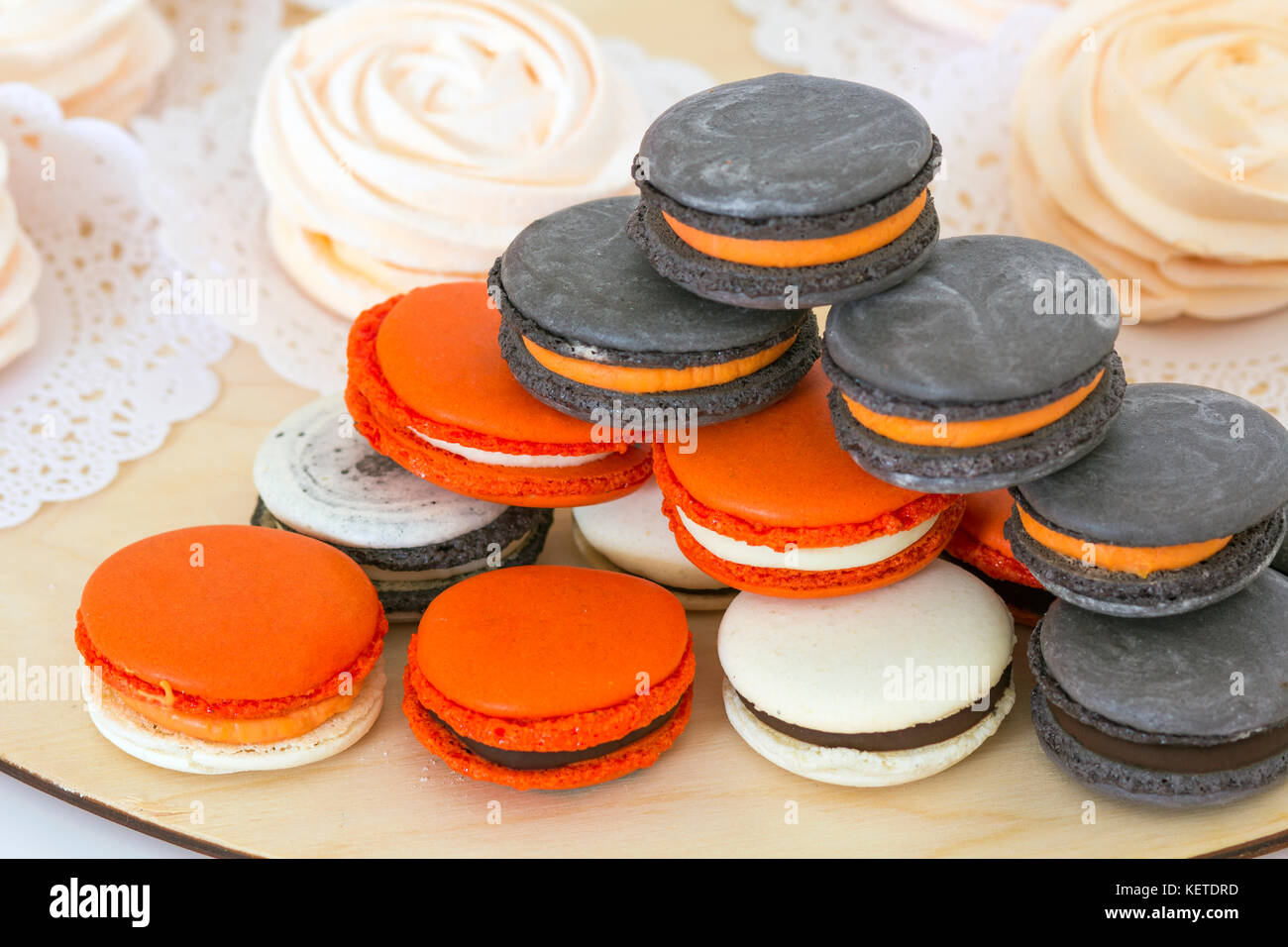 Different kinds of macaroons in stack on light background Stock Photo ...
