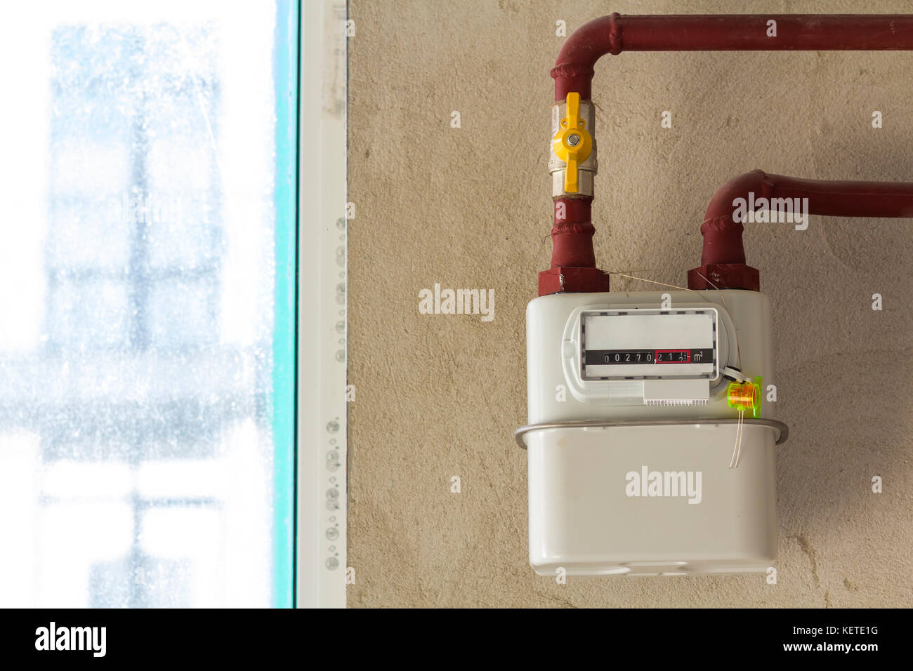 Gas meter in a house under renewal. Indoor gas meter used for measuring ...