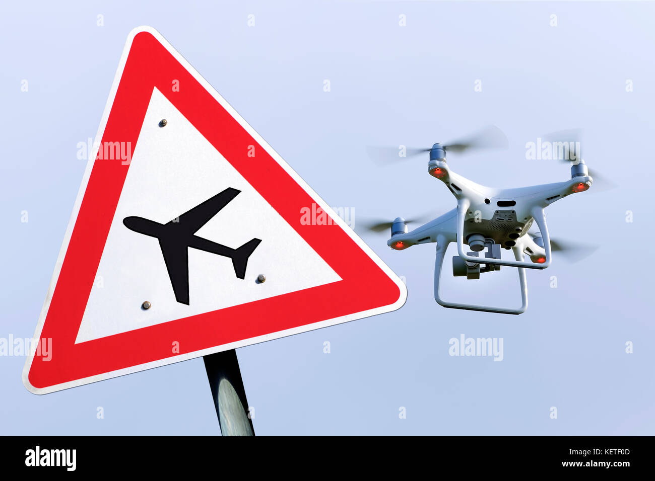 Flying drone and air traffic sign Stock Photo - Alamy