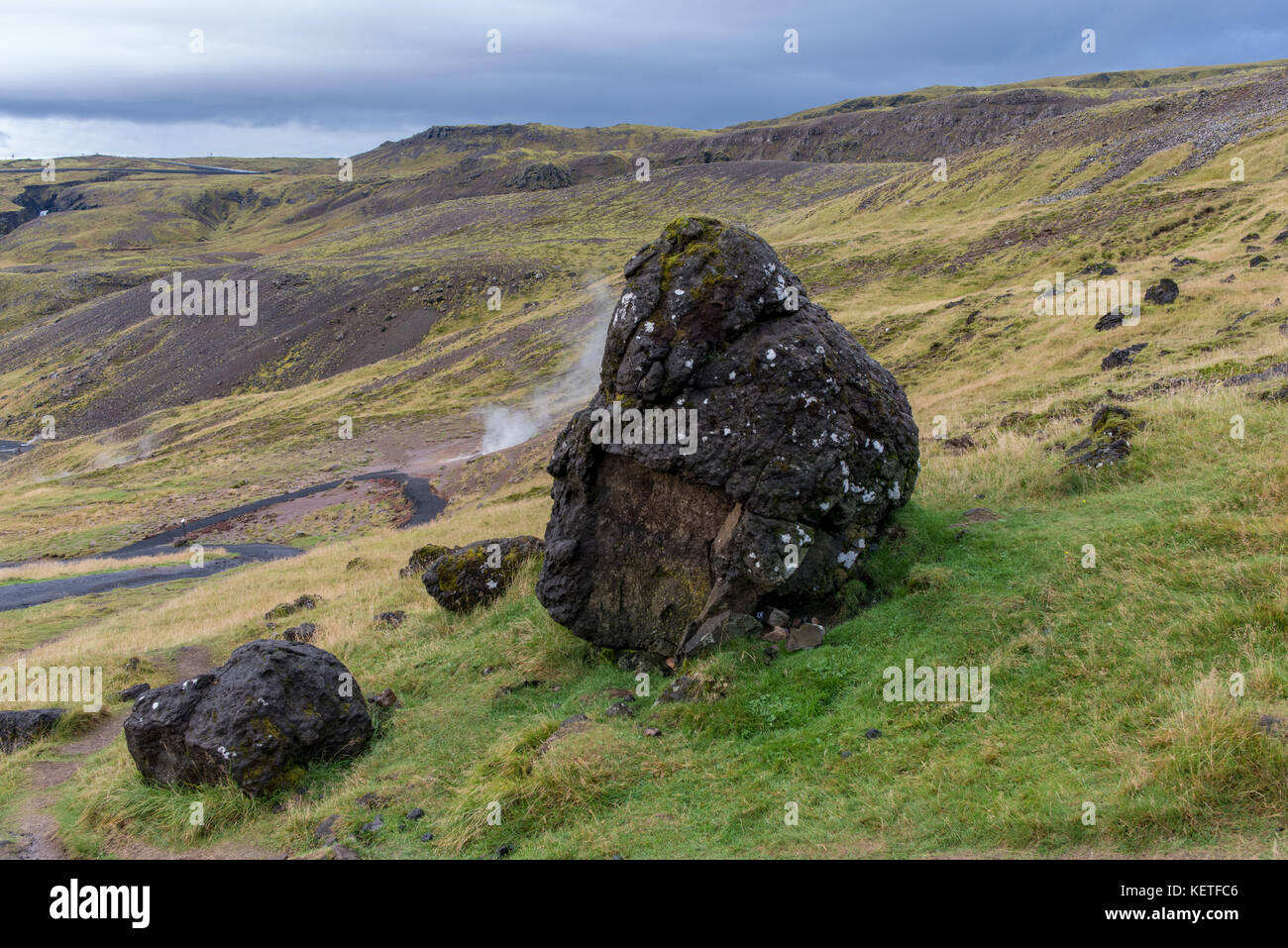 A big boulder near the hiking path Stock Photo - Alamy