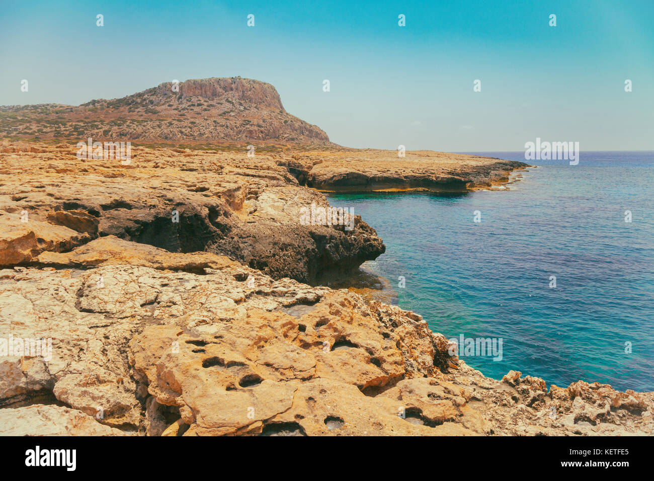 View of the open sea. Rocky seashore with blue sky. Beautiful ...