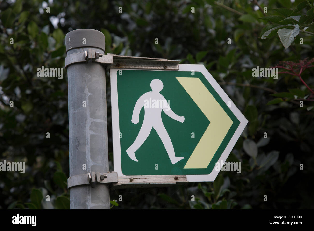 Green Treking Sign in Rural Setting Stock Photo - Alamy