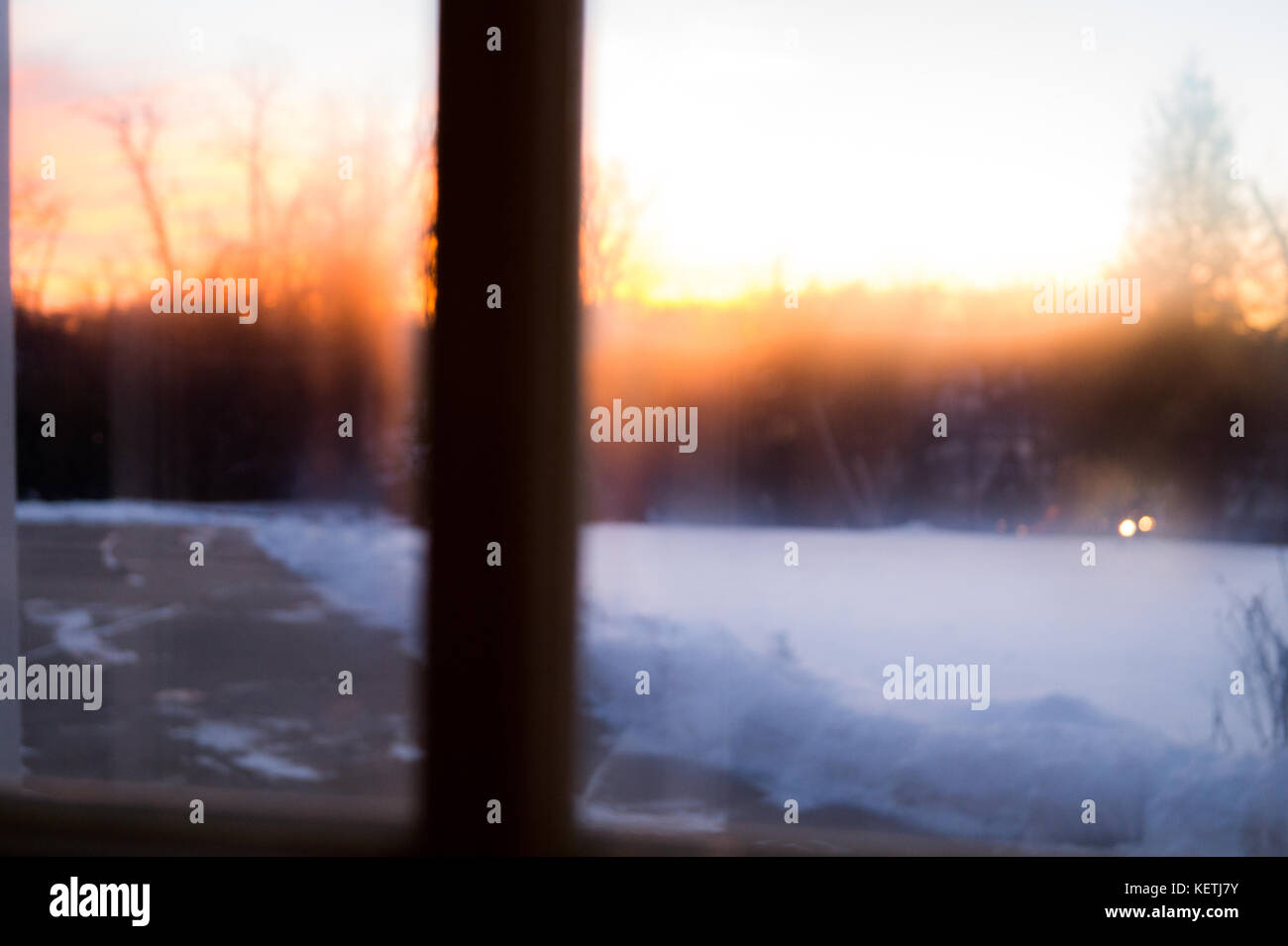 Looking out the Window on a Cold Winter Evening Stock Photo - Alamy