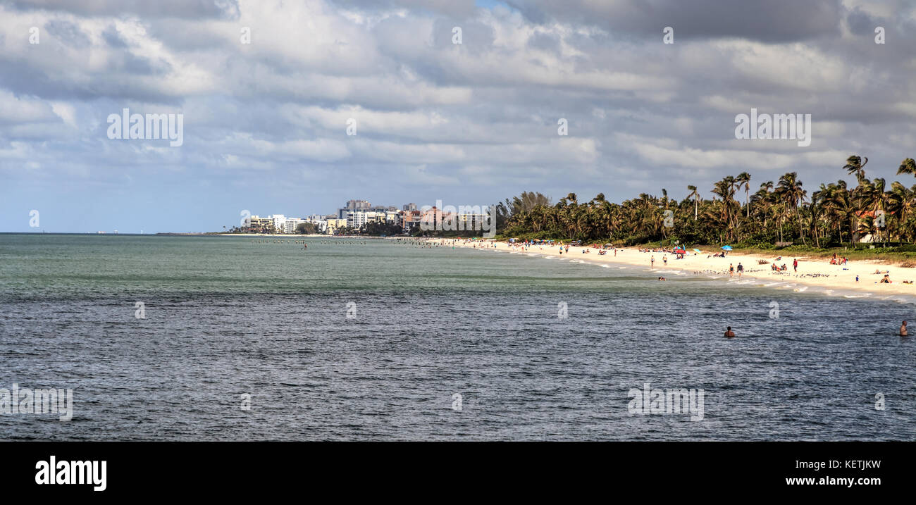 Long exposure of Naples Beach, Florida in the fall with the ocean ...