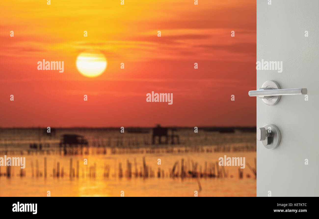 opened white door to beautiful seascape at sunset as background Stock ...