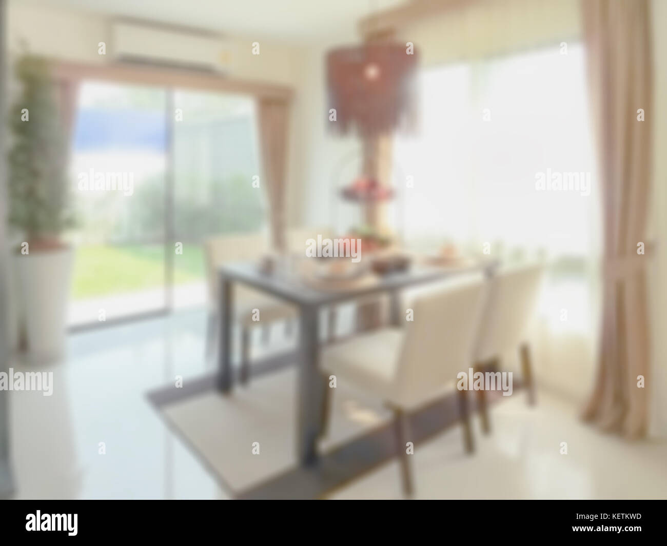 Blurred dining table in modern style Stock Photo - Alamy