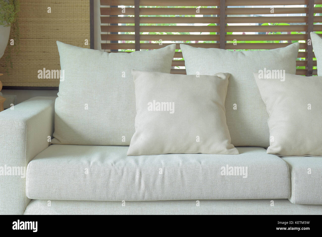 Beige color sofa set in the living room Stock Photo - Alamy