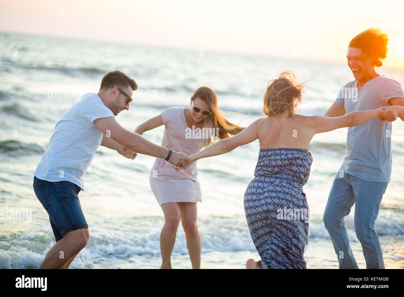 Joined hands woman dance hi-res stock photography and images - Alamy