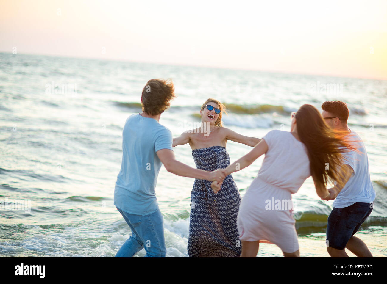 Joined hands woman dance hi-res stock photography and images - Alamy