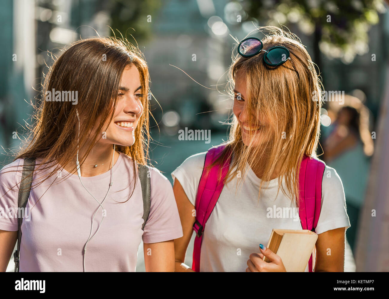 Best Friends Walking Happily Stock Photo - Alamy