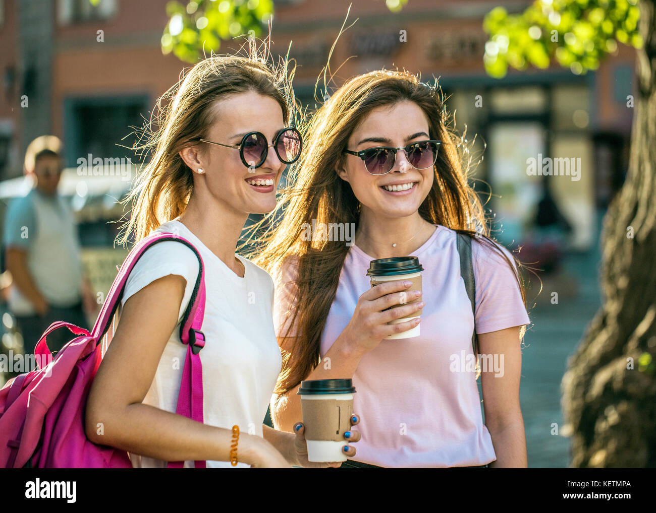 Best Friends with Coffee Cups Stock Photo - Alamy