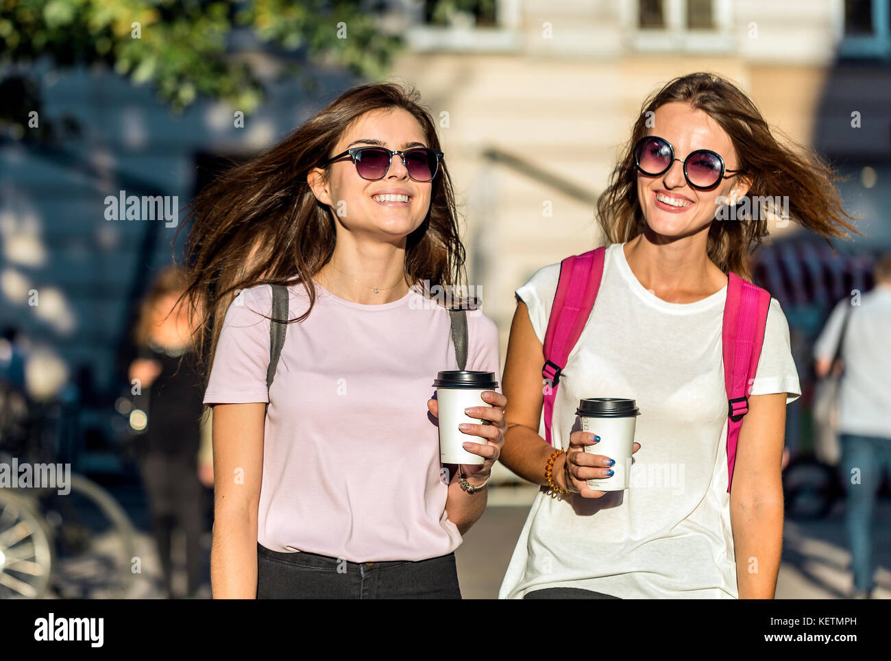 Best Friends with Coffee Cups Stock Photo - Alamy