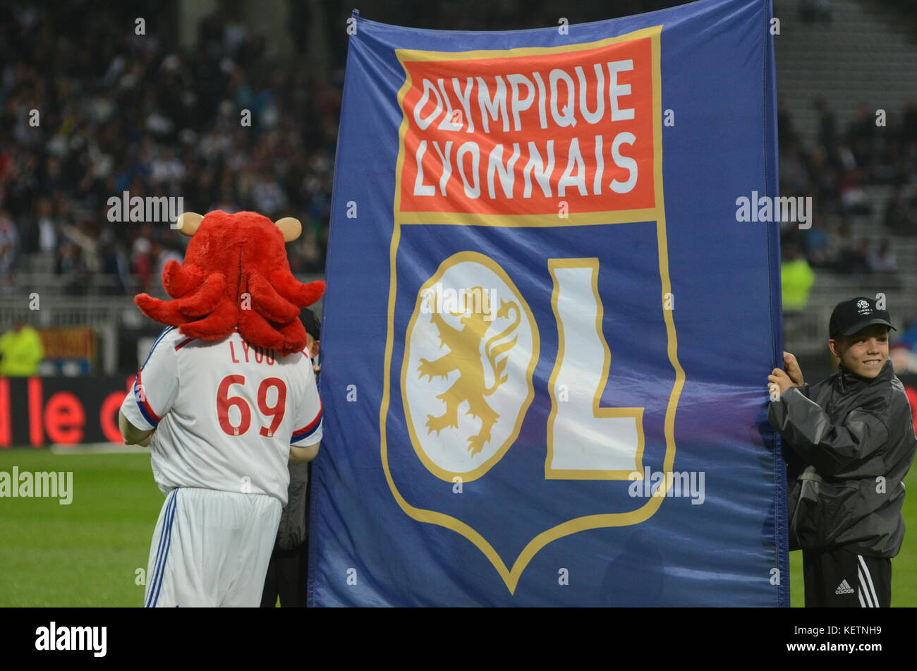 Olympique Lyonnais flag bearers at Gerland Stadium, Lyon, France Stock ...