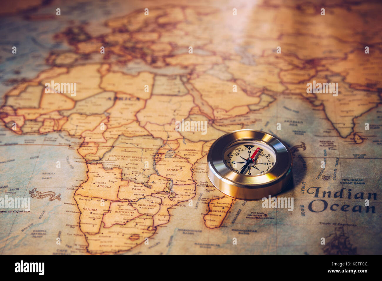 Golden Compass and the Map. Travel and Navigation Theme. Map used for ...