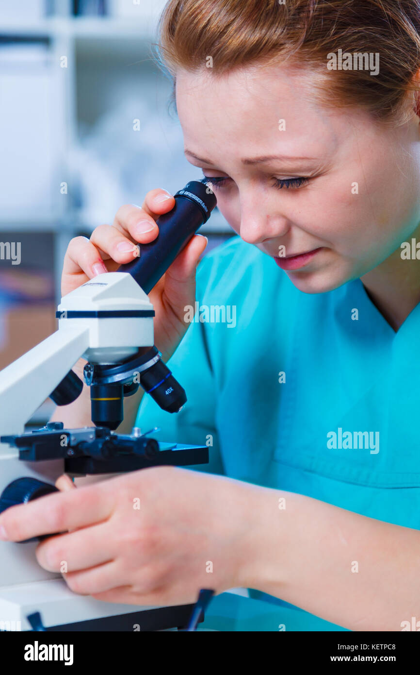 Nurse doing medical analysis Stock Photo - Alamy