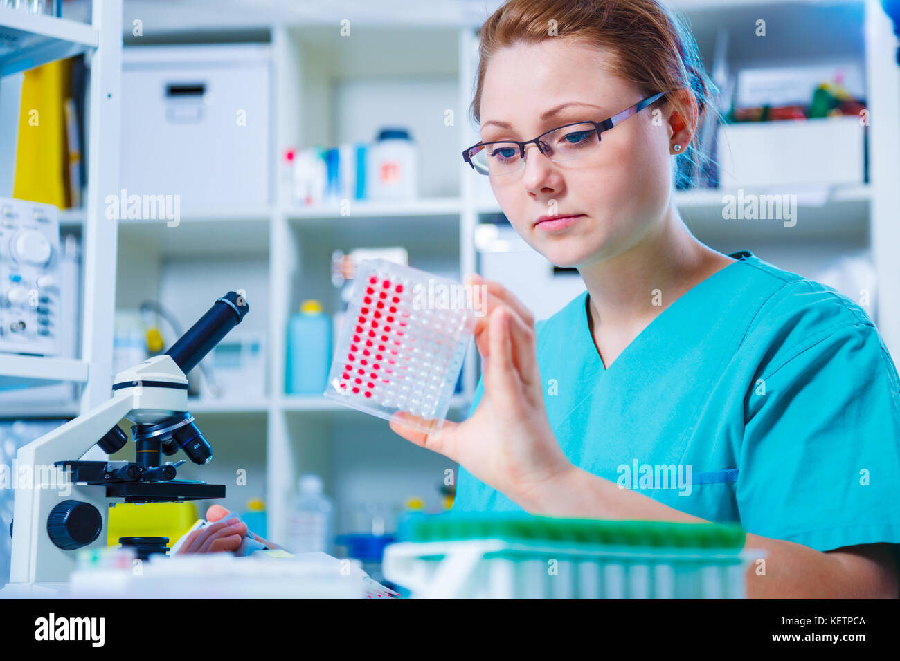 Nurse doing medical analysis Stock Photo - Alamy