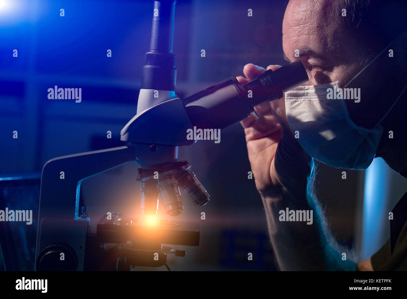 Doctor examines patient tissue samples Stock Photo - Alamy