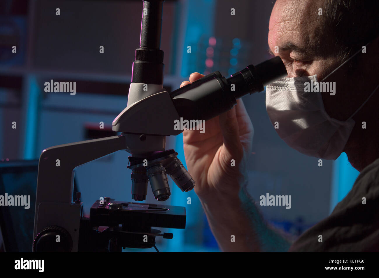 Doctor examines patient tissue samples Stock Photo - Alamy
