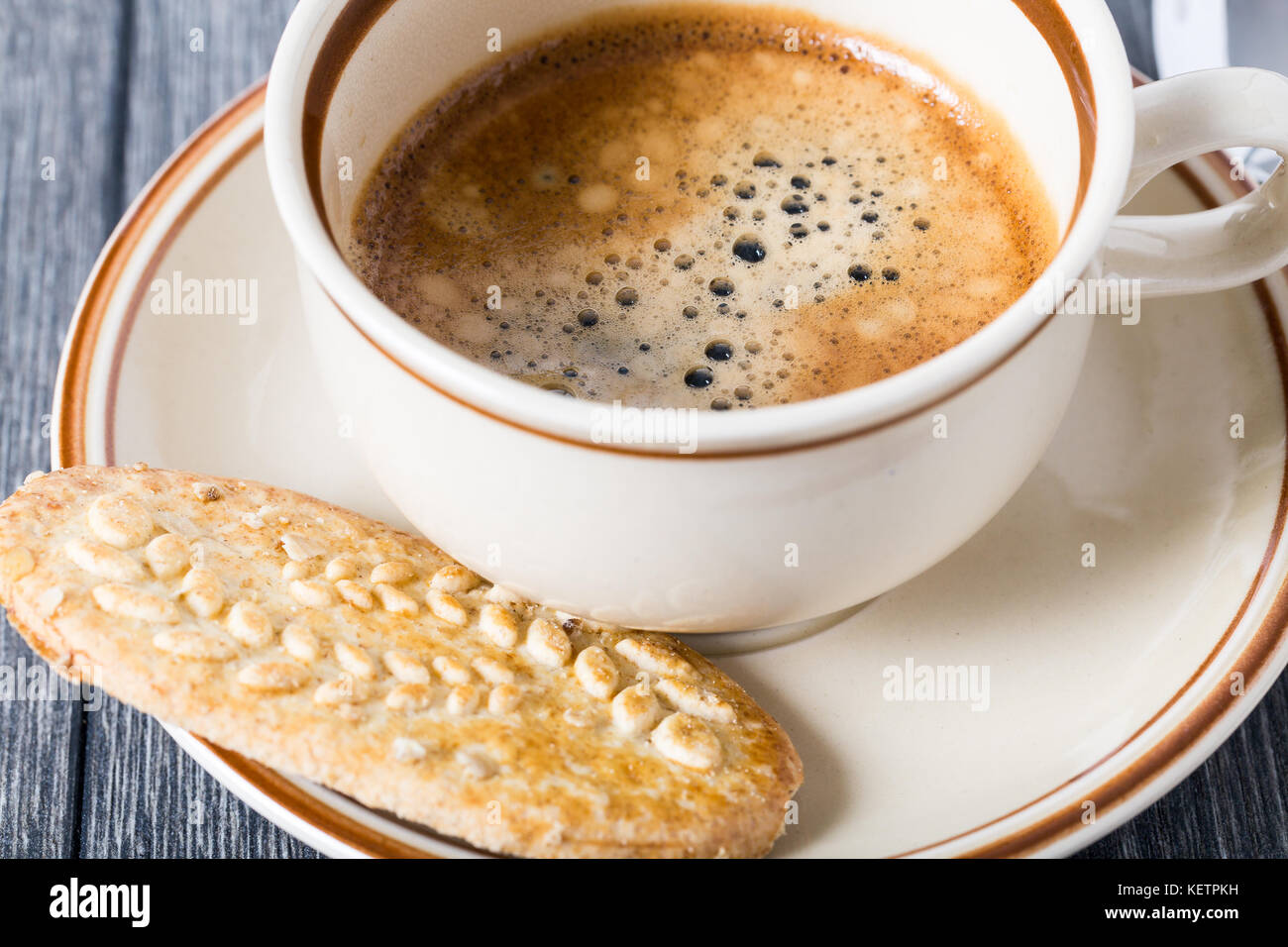 A cup of coffee and biscuits Stock Photo - Alamy