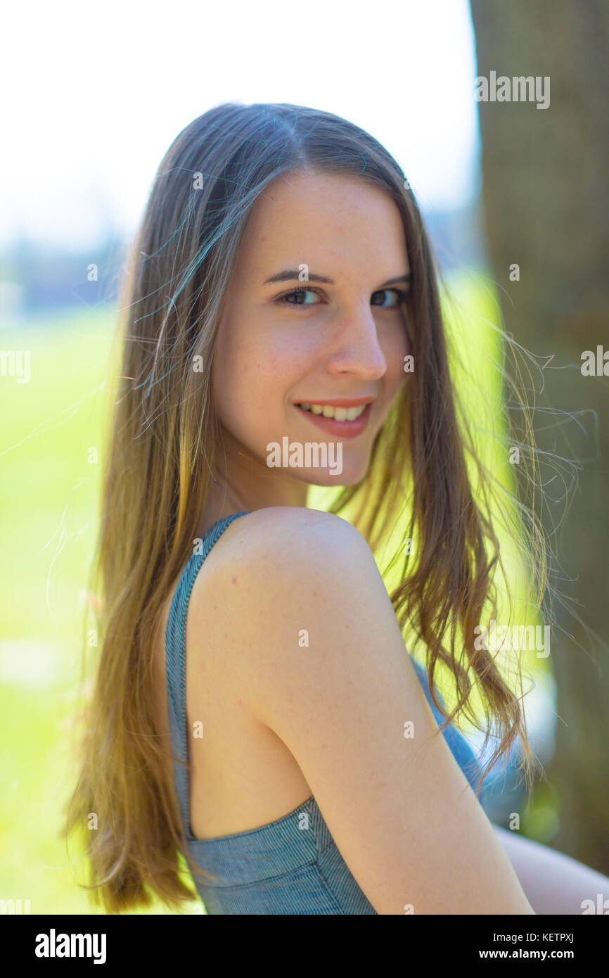 Head Outdoor Portrait Of A Brunette Slim Girl With Long Hair In The