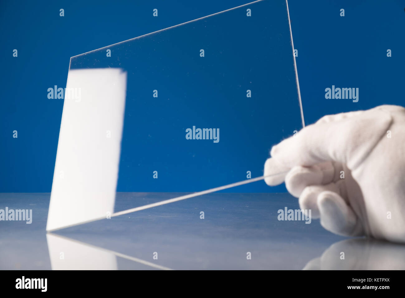 Bulletproof glass in the laboratory of optics. Checking the optical ...