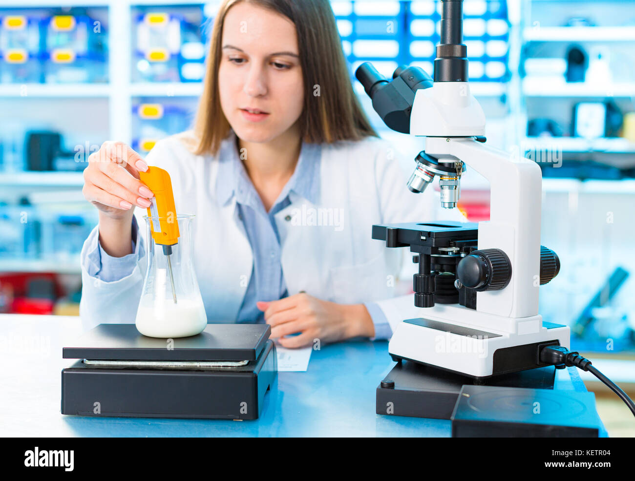 Quality control for processed foods. Dairy product research Stock Photo ...