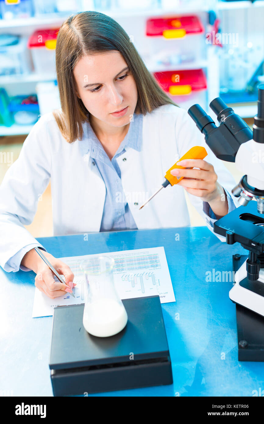 Quality control for processed foods. Dairy product research Stock Photo ...