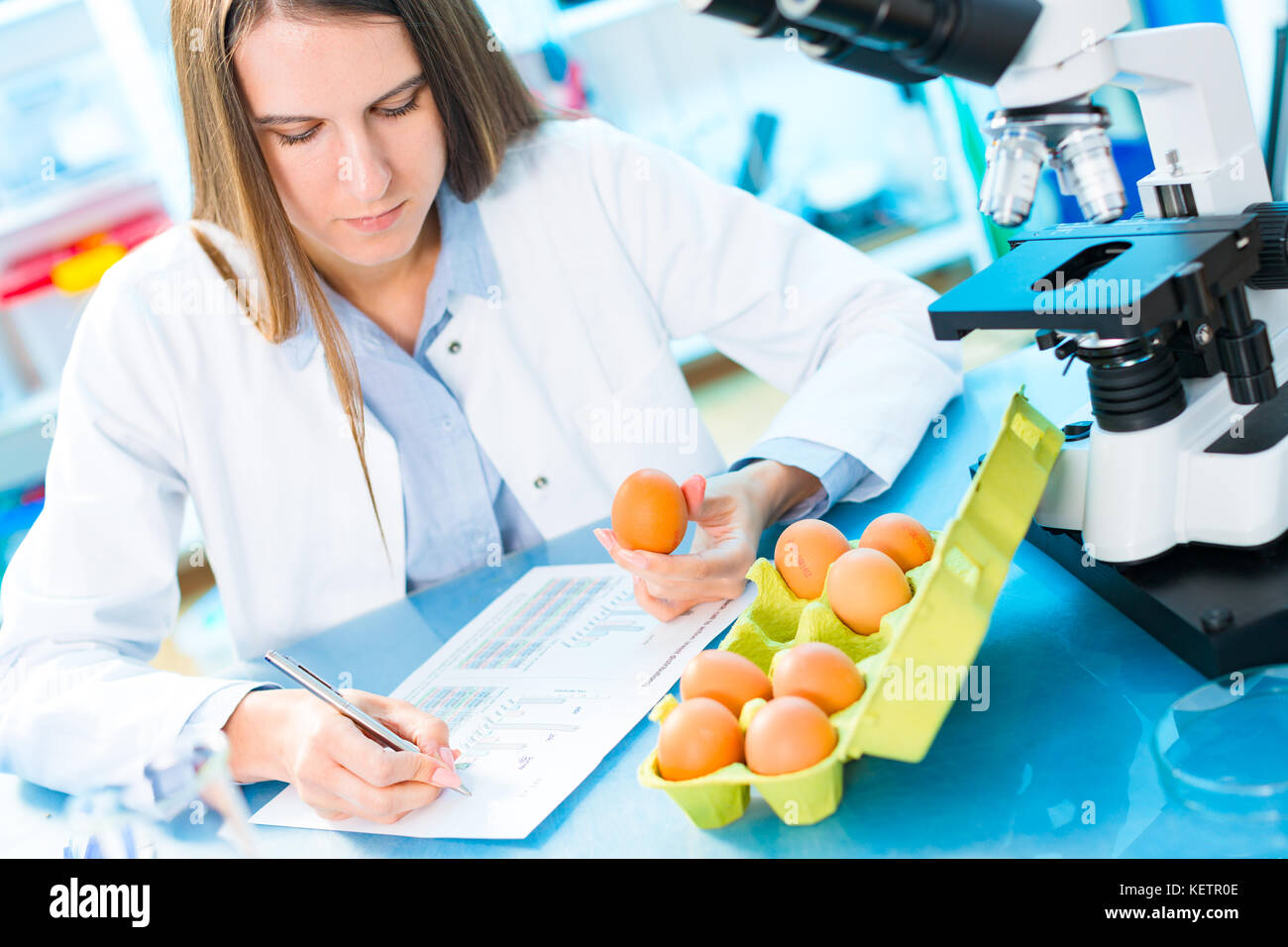Eggs product research. Quality control processing foods Stock Photo - Alamy