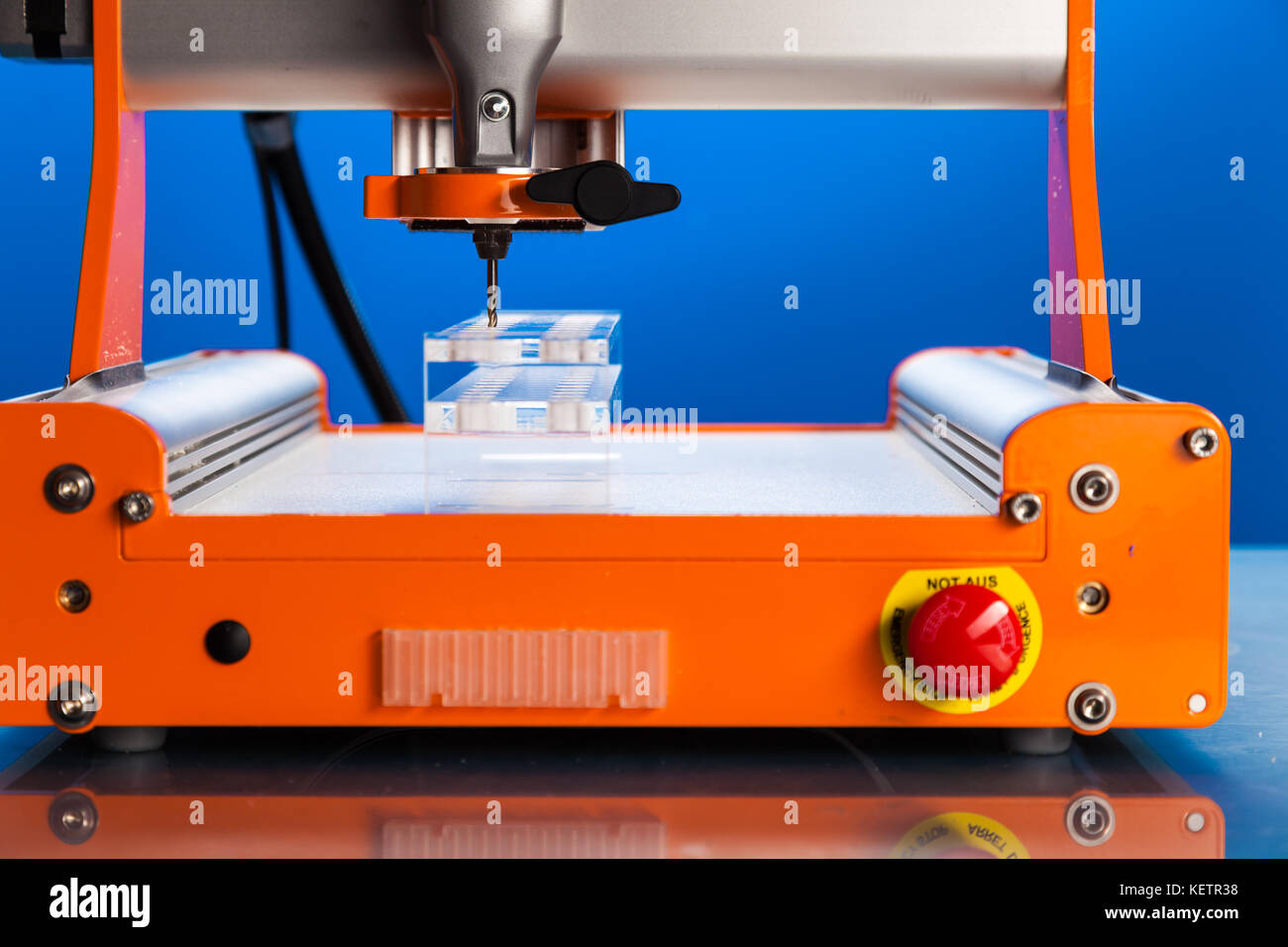 The milling machine processes the plastic blank Stock Photo - Alamy