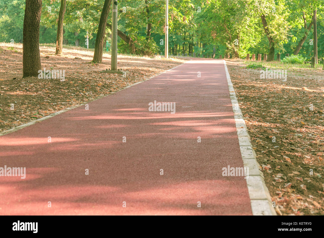 Red track rubber made from crumb and flexible core for running in the ...