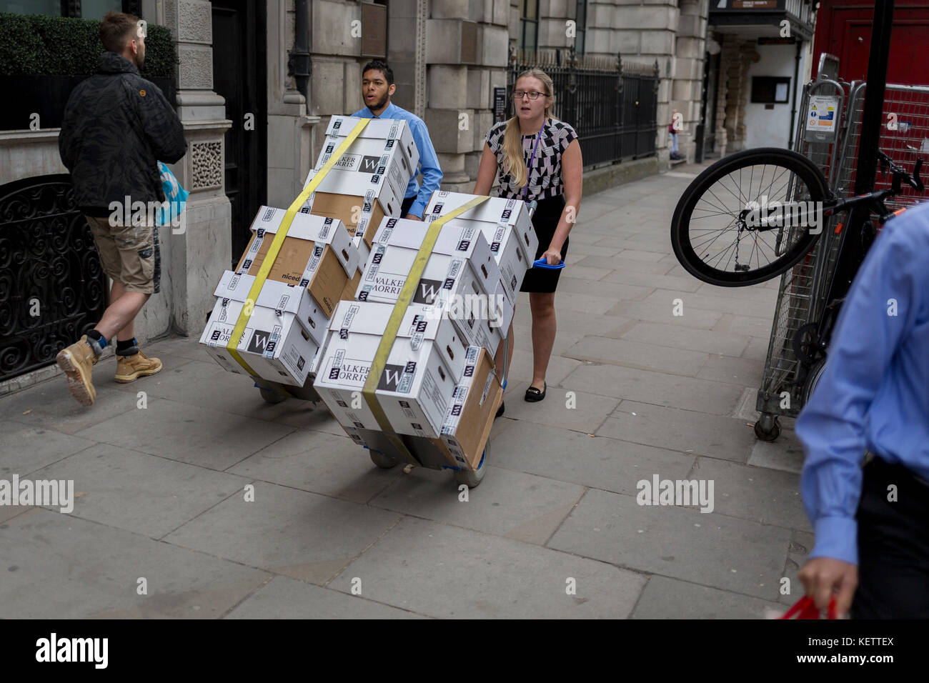 Pushing trolleys hi-res stock photography and images - Alamy