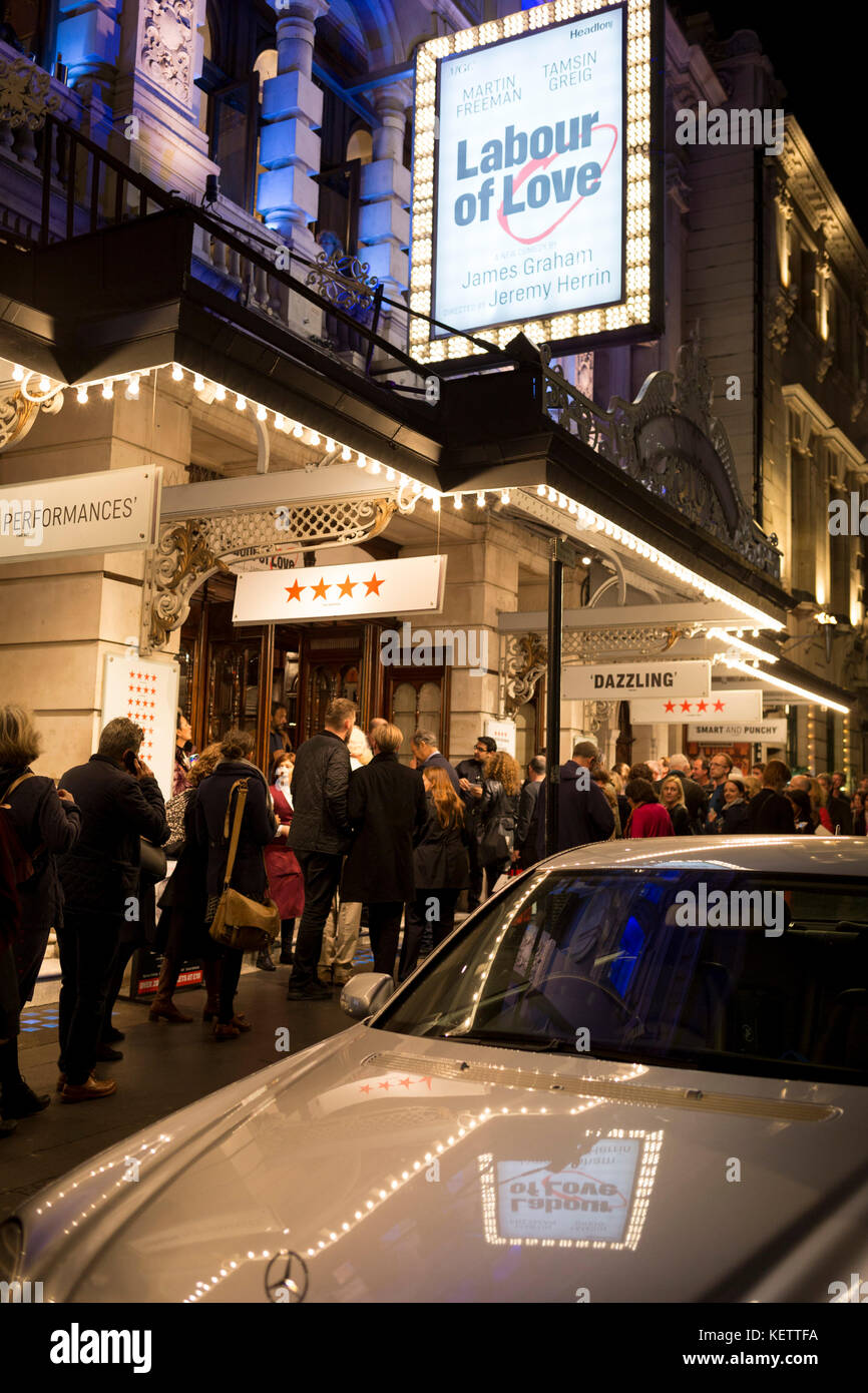 Theatre-goers outside the Noel Coward Theatre in St. Martin's Lane ...