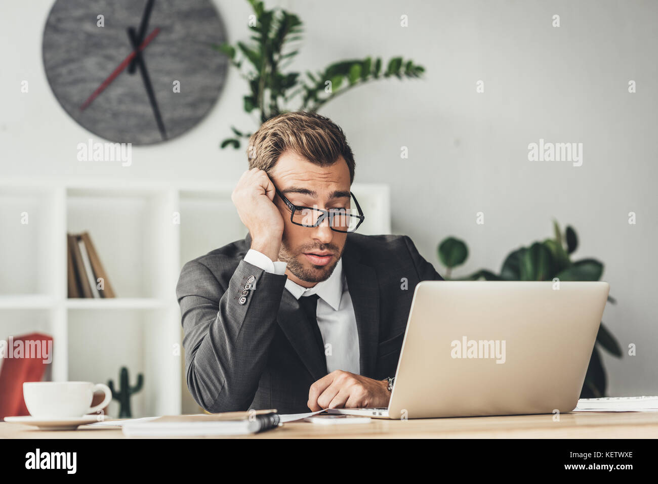Business paperwork young overworked hi-res stock photography and images ...