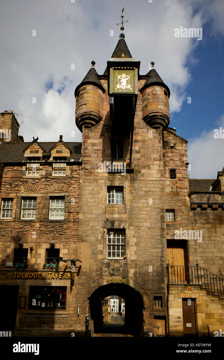 ornate street clock on Historic Edinburgh, Scotland, Canongate Tolbooth ...