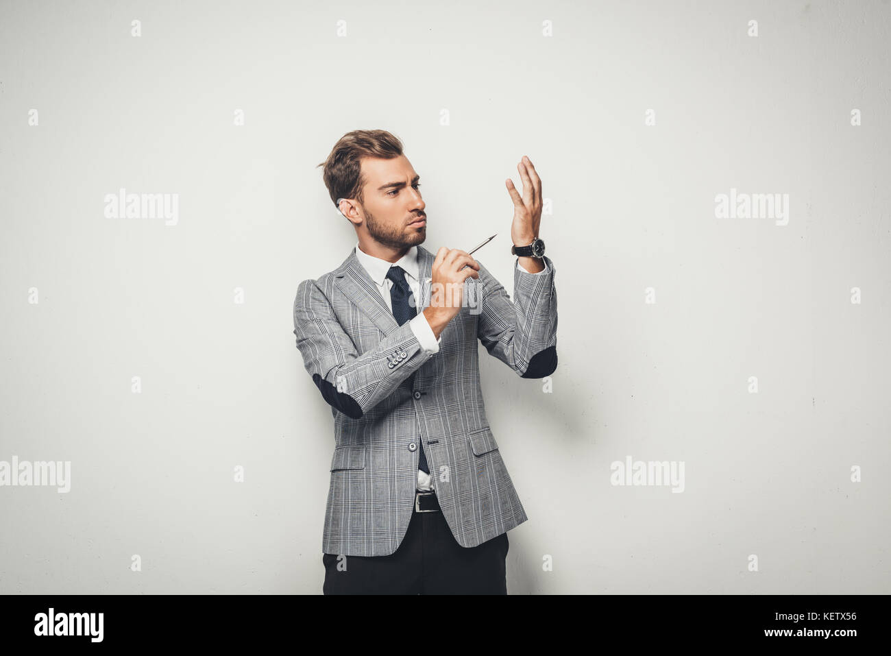 businessman drawing himself with pencil Stock Photo - Alamy