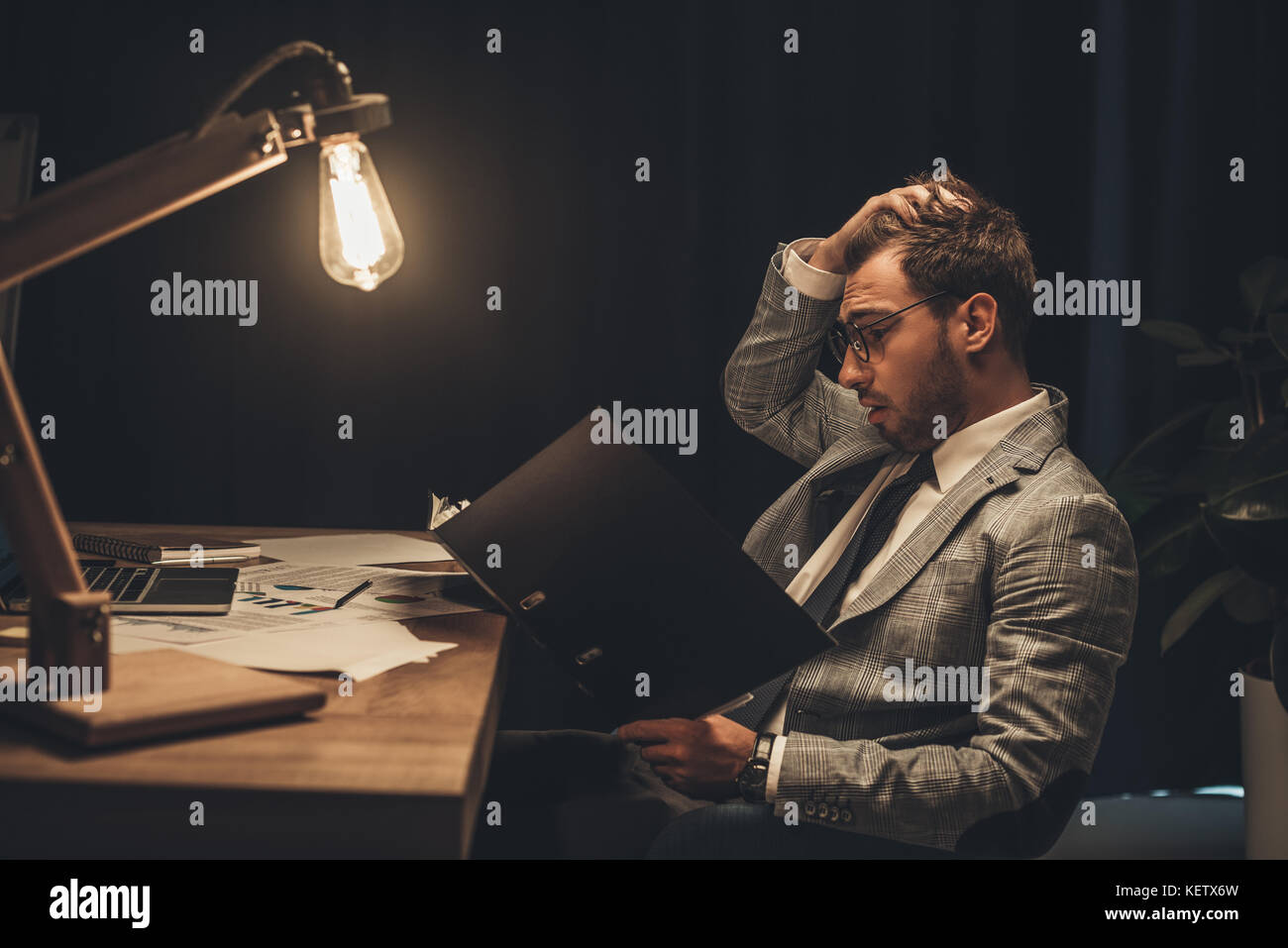 Business paperwork young overworked hi-res stock photography and images ...