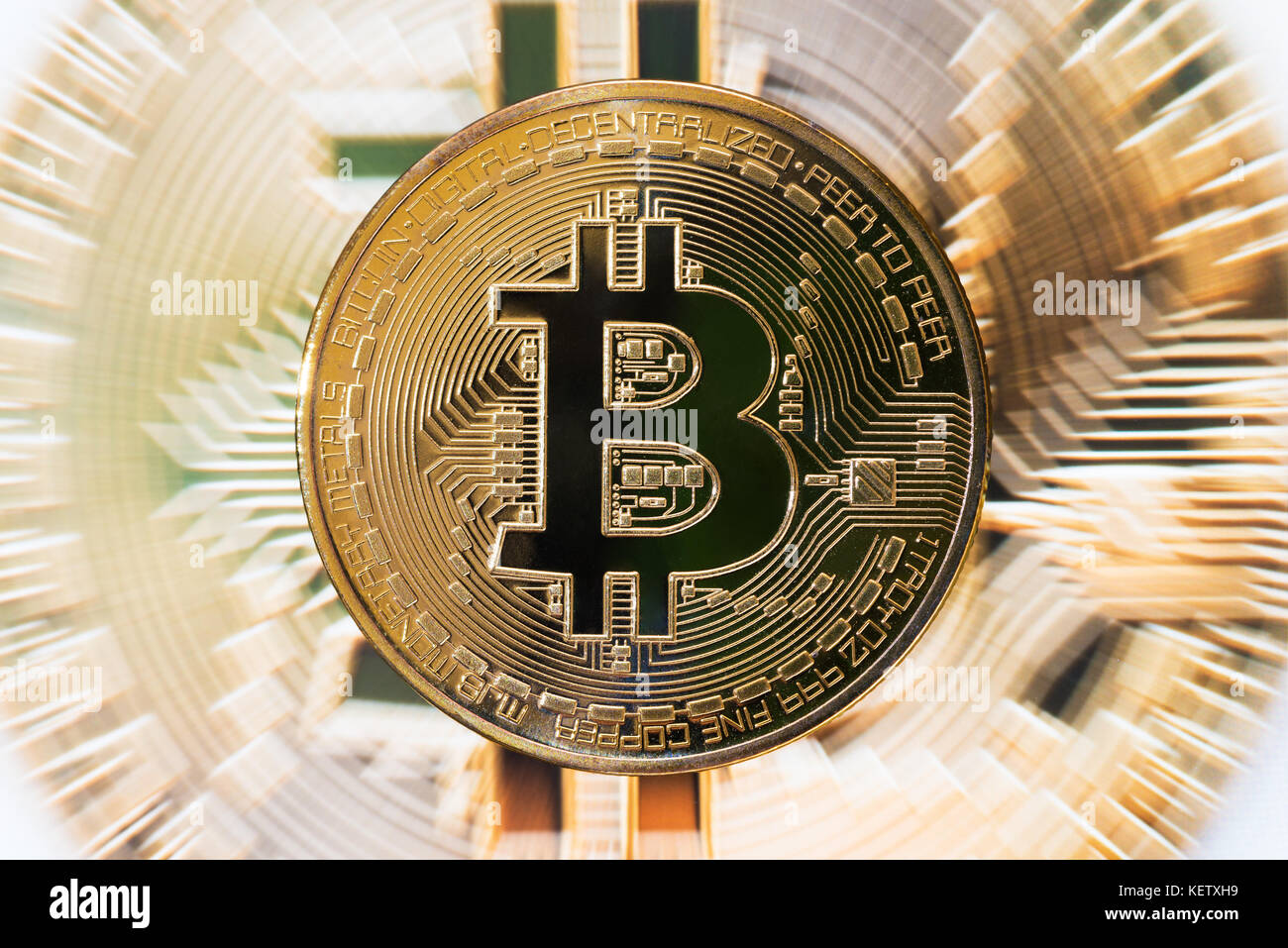 Bitcoin with motion blurred bitcoin background Stock Photo - Alamy