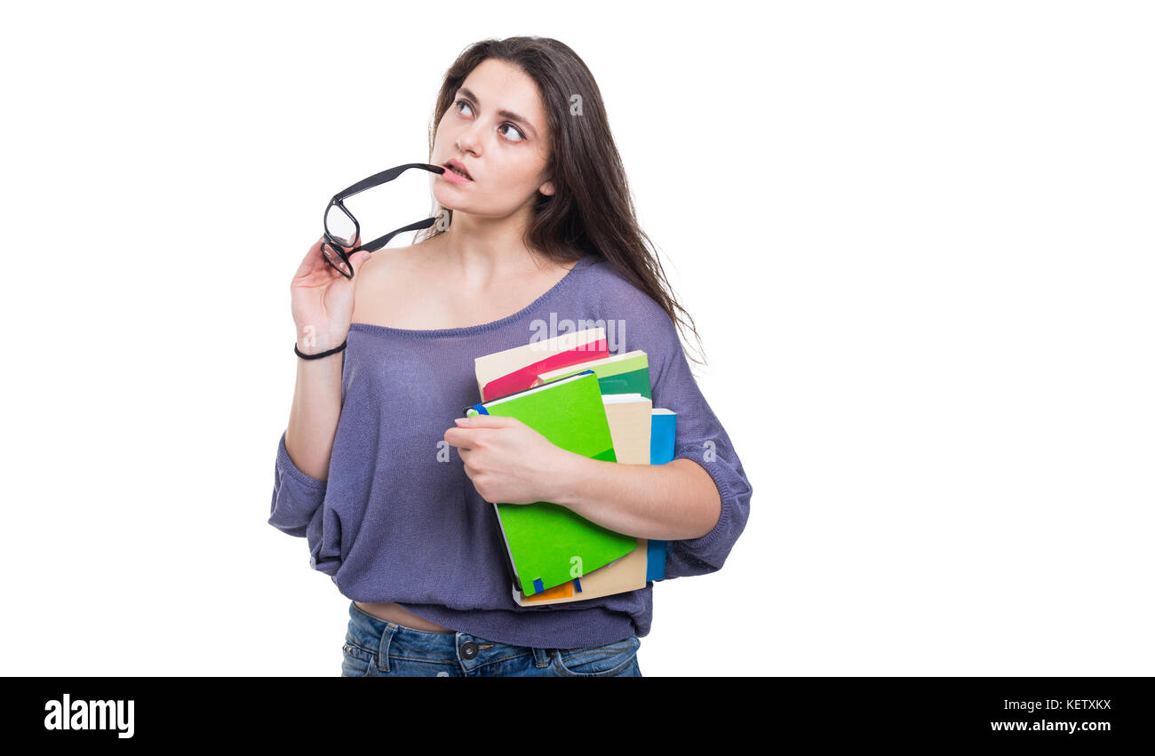 Young university student thinking and looking up isolated on white ...