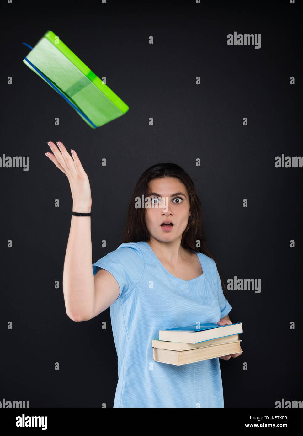 Throwing books hi-res stock photography and images - Alamy