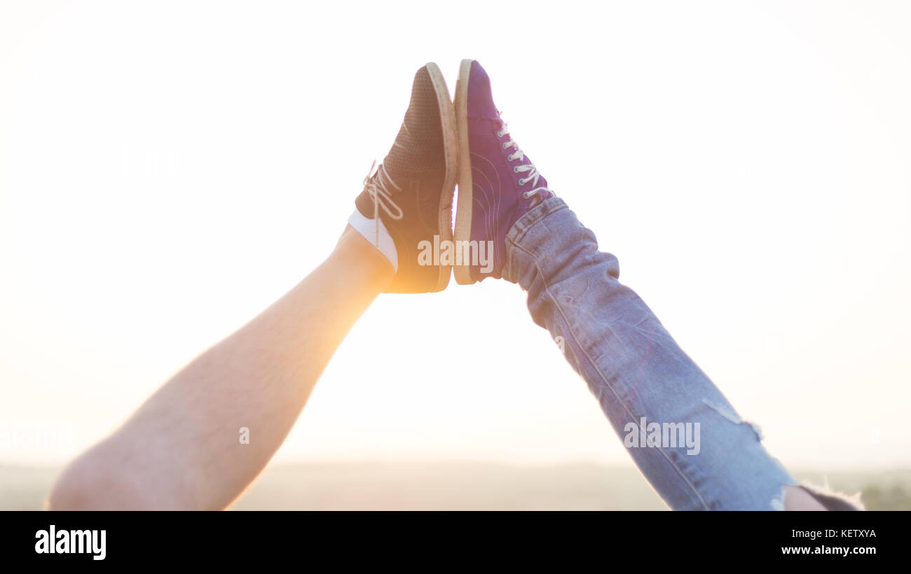 Couple touching legs hi-res stock photography and images - Alamy