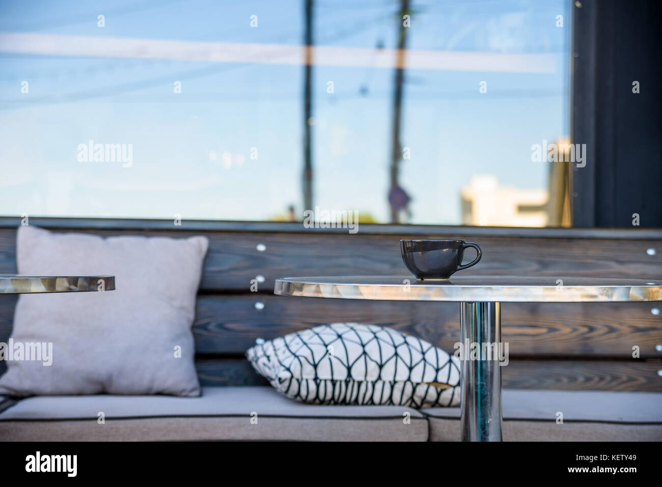Close up black teacup on restaurant table Stock Photo - Alamy