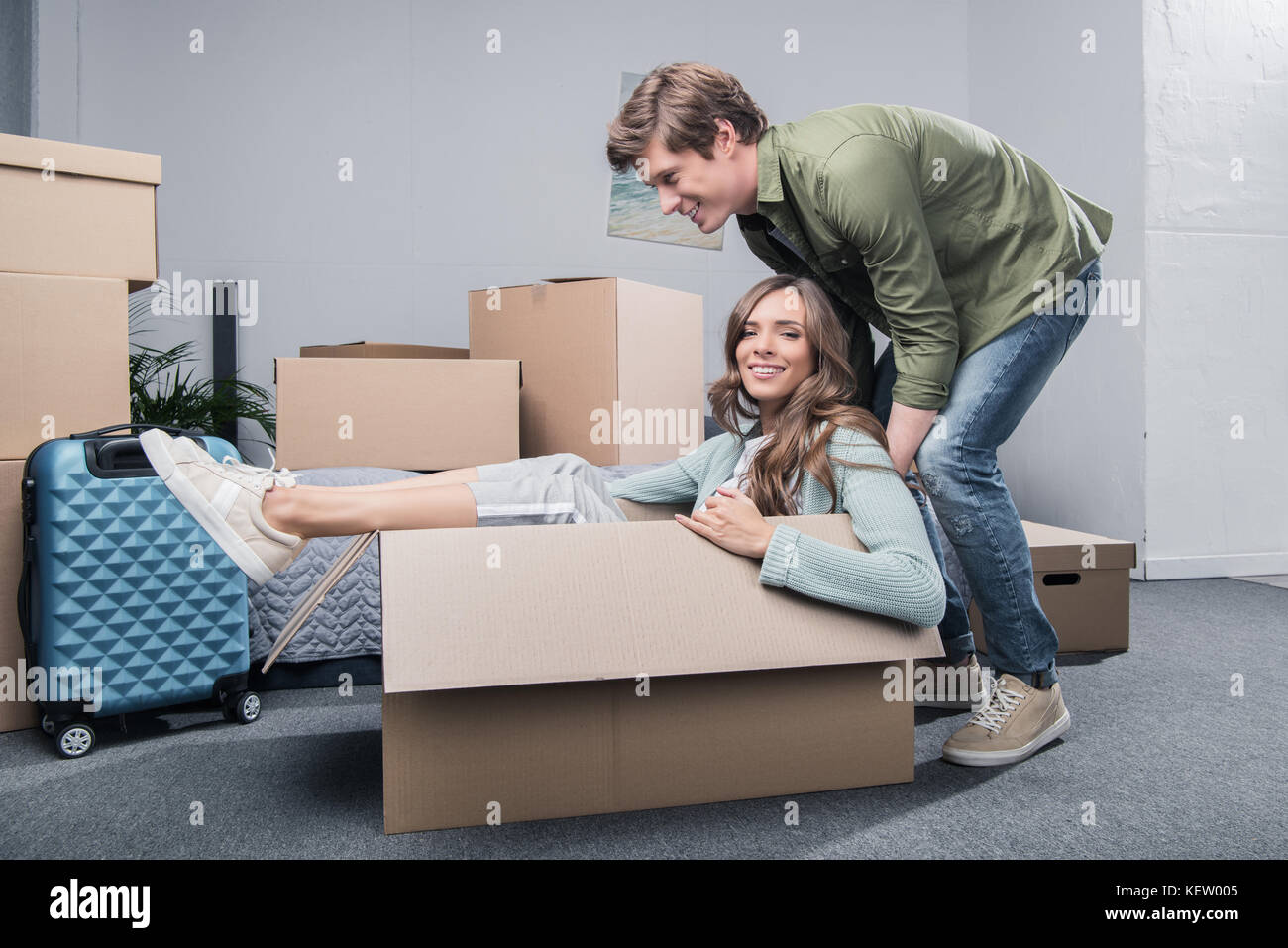 couple having fun at new home Stock Photo - Alamy