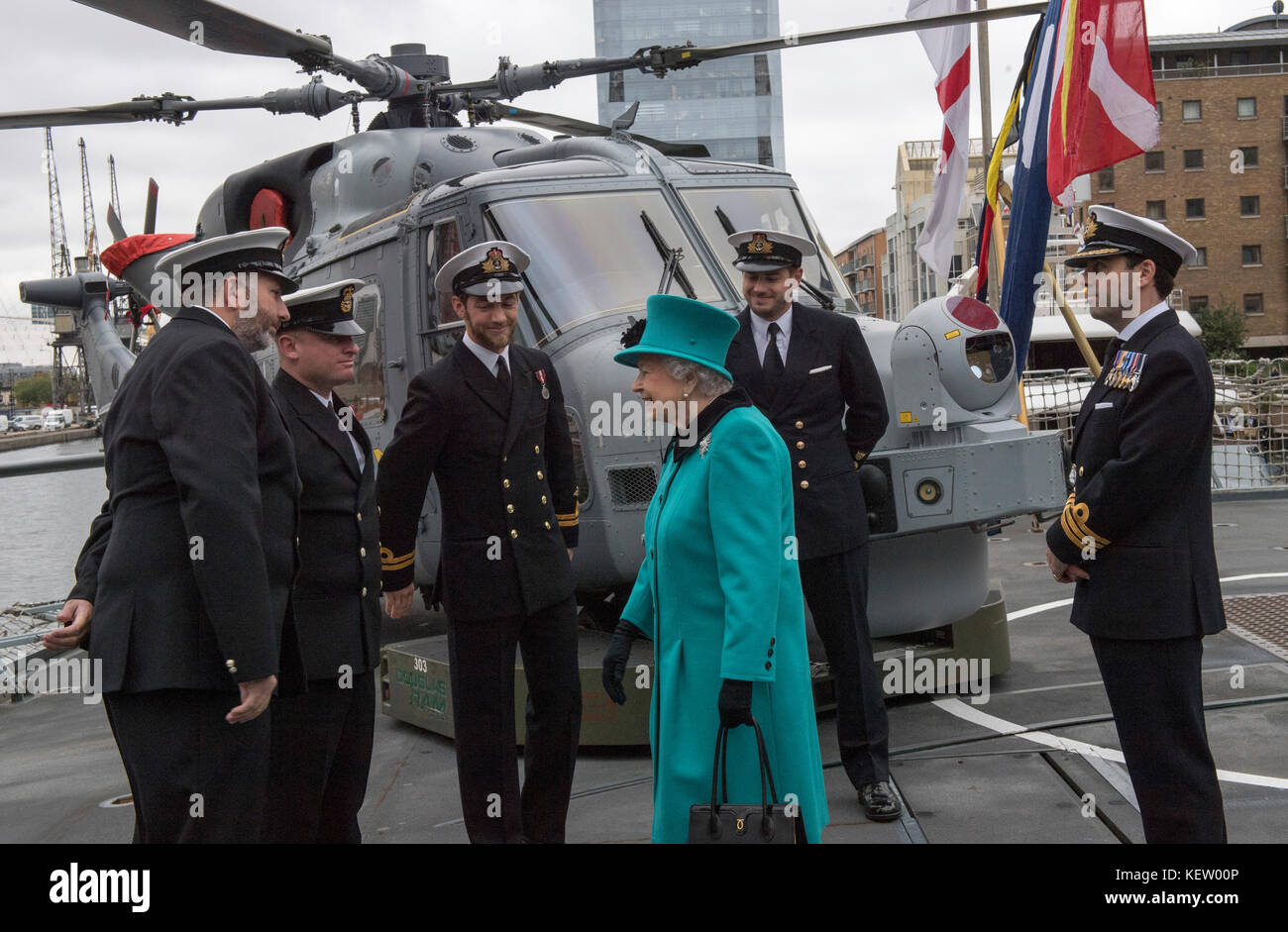 Queen Elizabeth II during a visit to HMS Sutherland in West India Dock ...