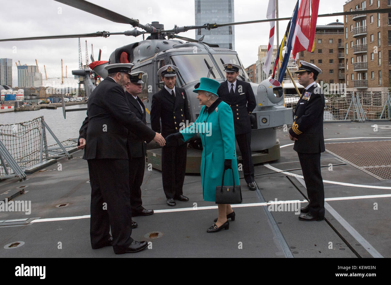 Queen Elizabeth II during a visit to HMS Sutherland in West India Dock ...