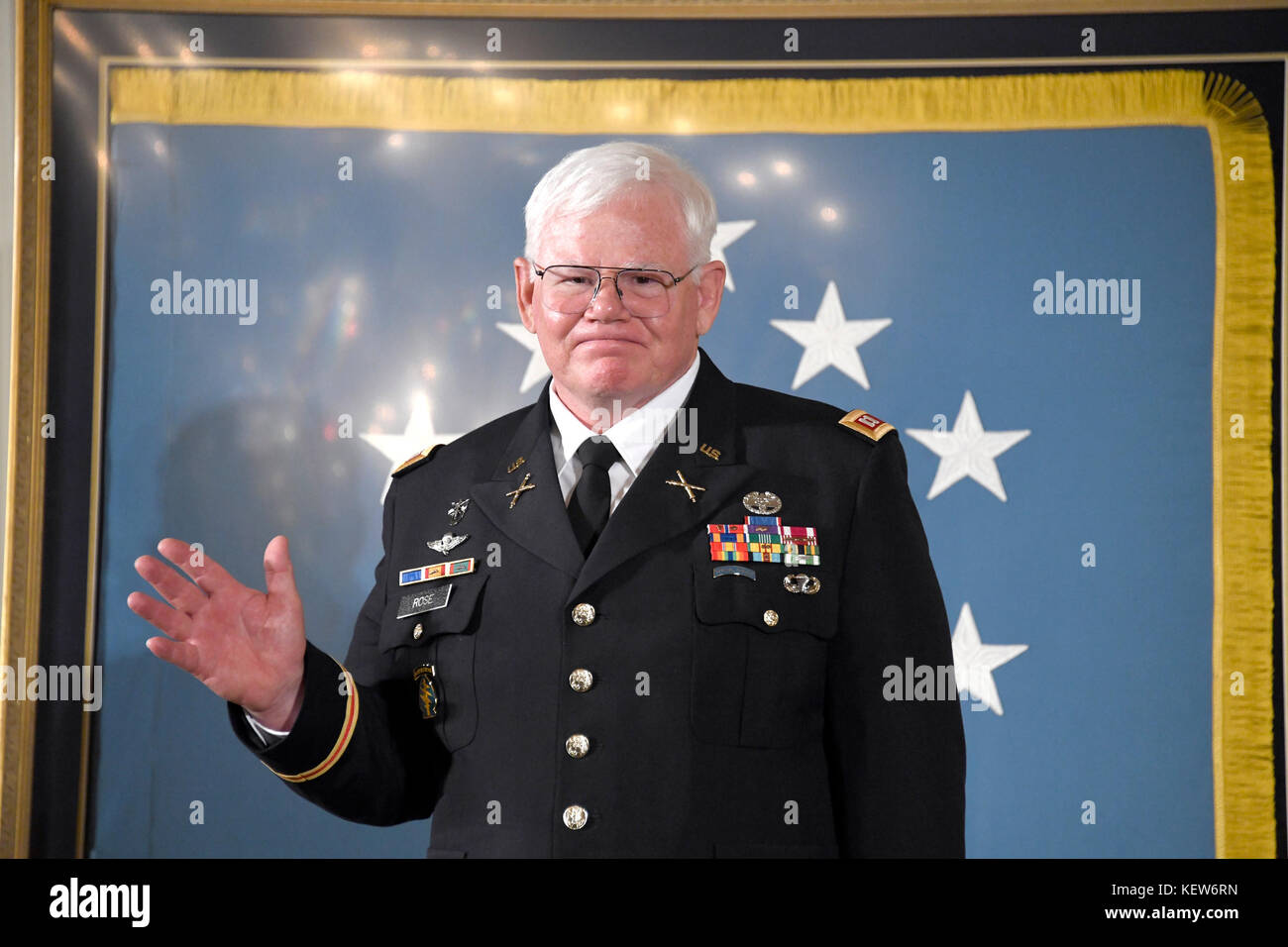 United States Army Captain Gary M. Rose acknowledges the applause as US ...