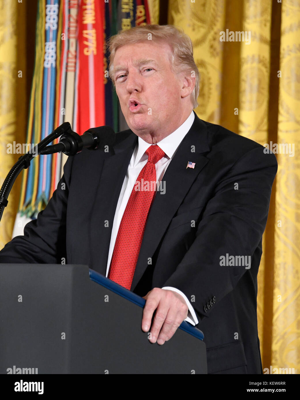 United States President Donald J. Trump makes remarks as he presents ...