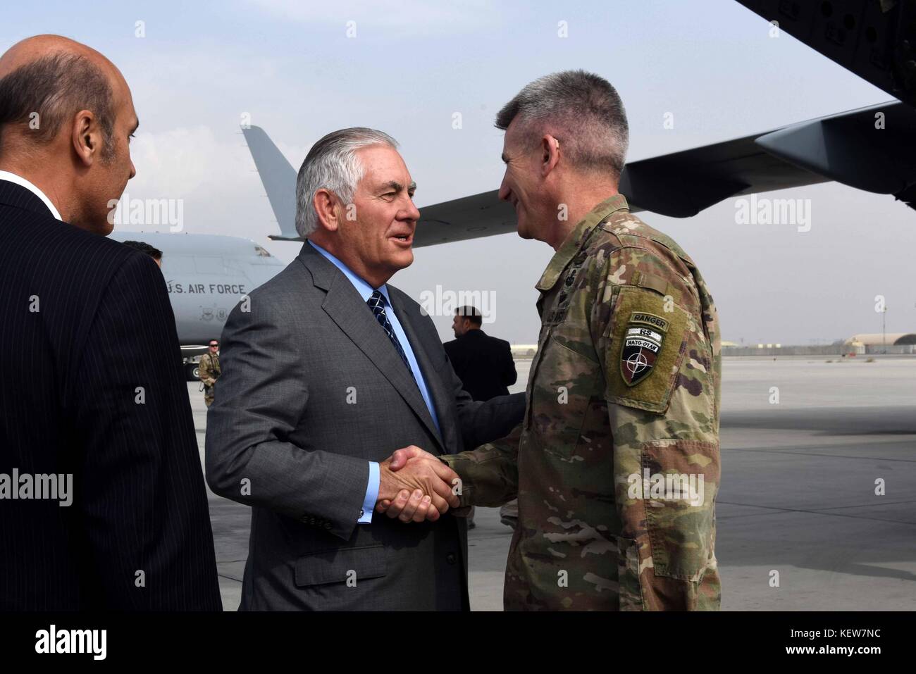 U.S. Secretary of State Rex Tillerson, center, bids farewell to Gen ...