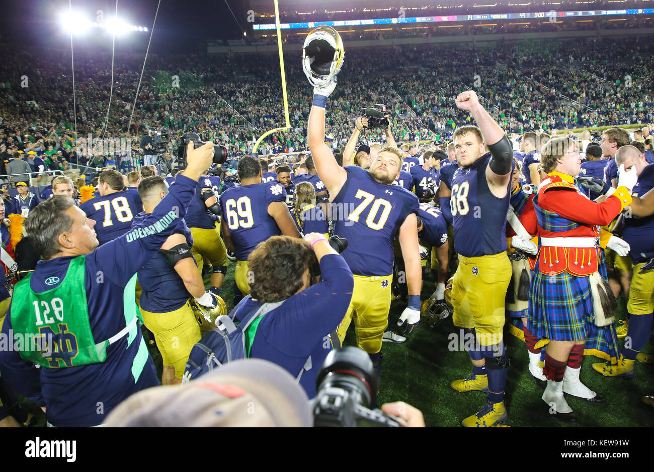 Notre Dame players sing the fight song after playing agains the ...