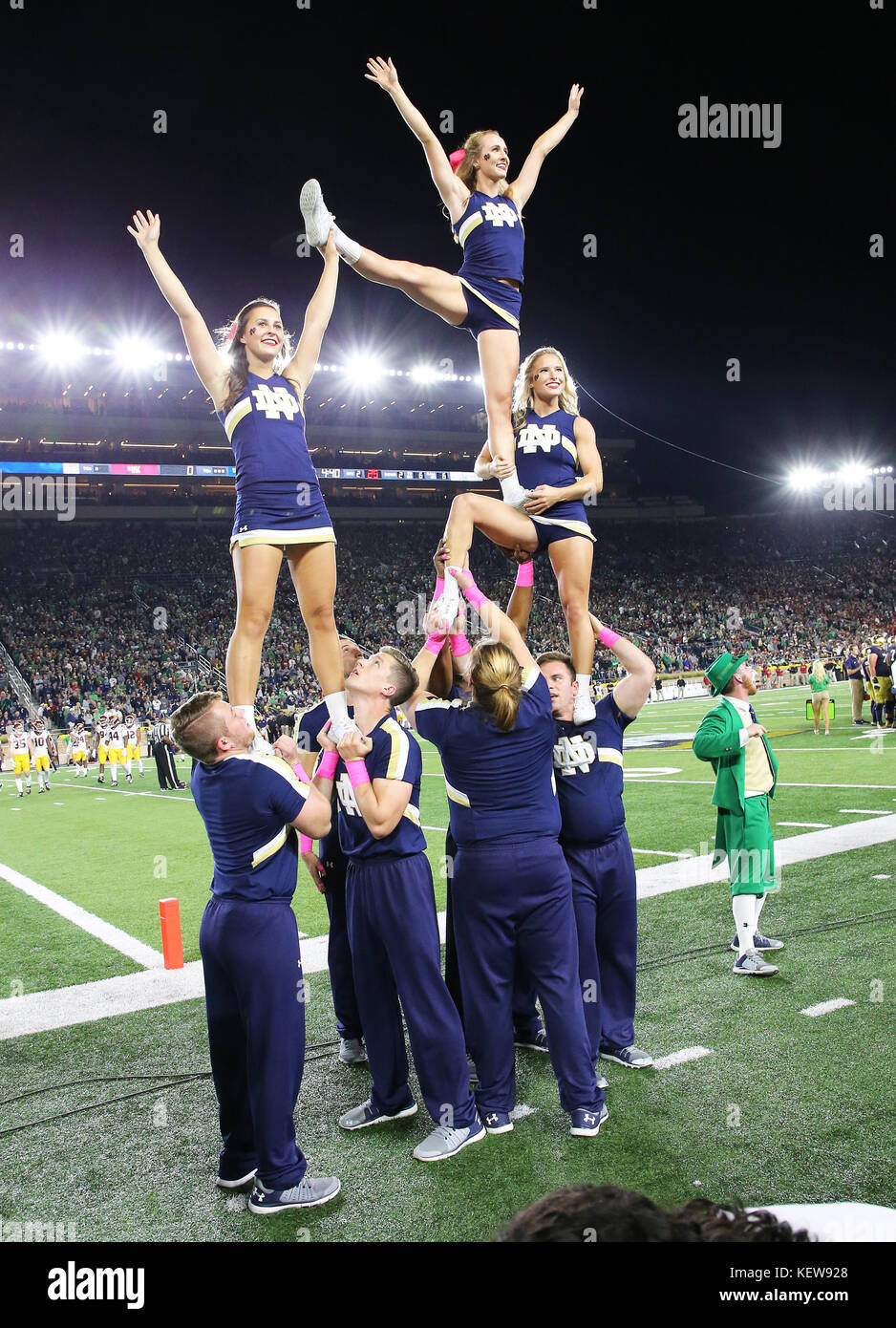 Notre Dame cheerleaders perform during an NCAA football game against ...