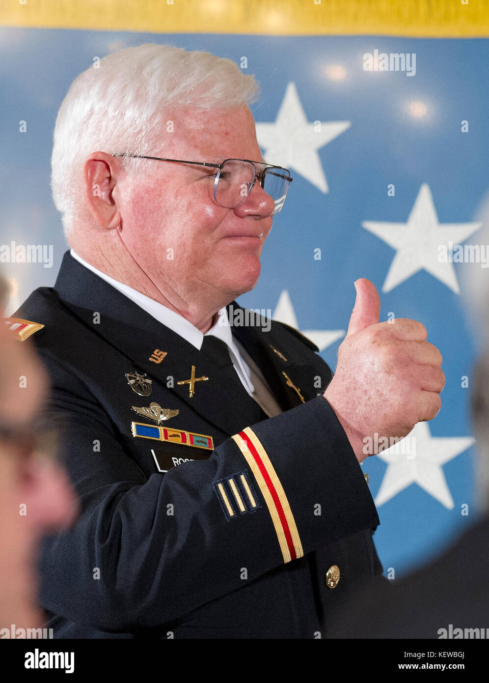 United States Army Captain Gary M. Rose acknowledges the applause as US ...